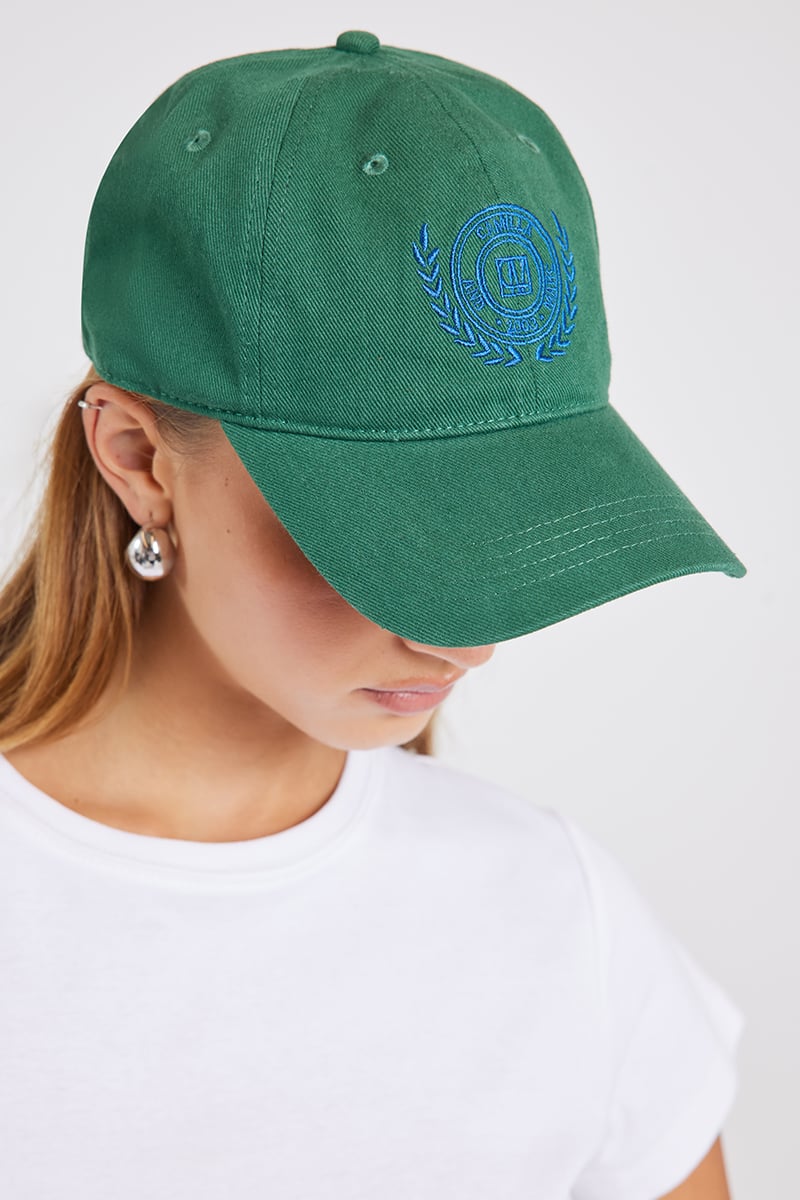 Camilla and Marc Wade Cap Green | Stylerunner